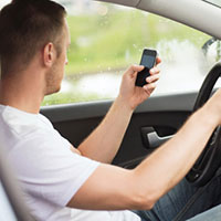 Take the Distracted Driving Quiz Today | DMV.ORG